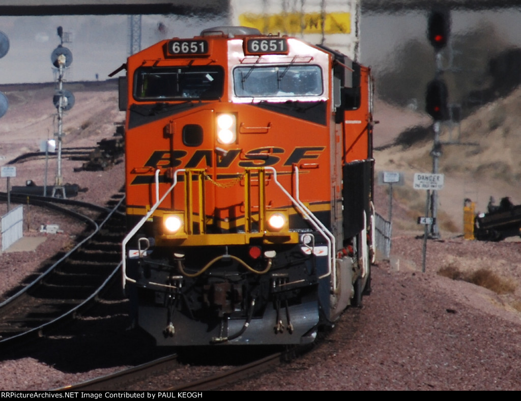 BNSF 6651 close in shot off her as the exhaust plume heat blurs the JB Hunt Intermodel container ...